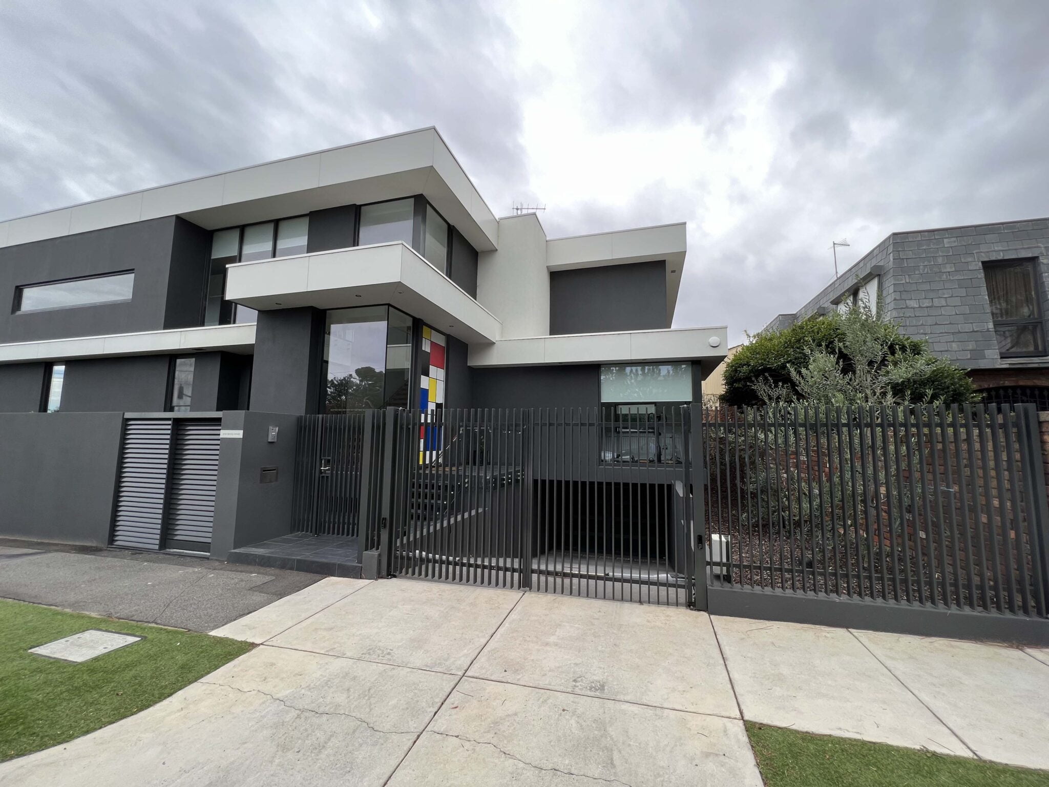Powder-coated steel balustrade with scrolls - Templestowe | Haven Fencing